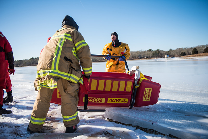 Firefighters brave bitter temps for ice rescue drill - The Martha's ...
